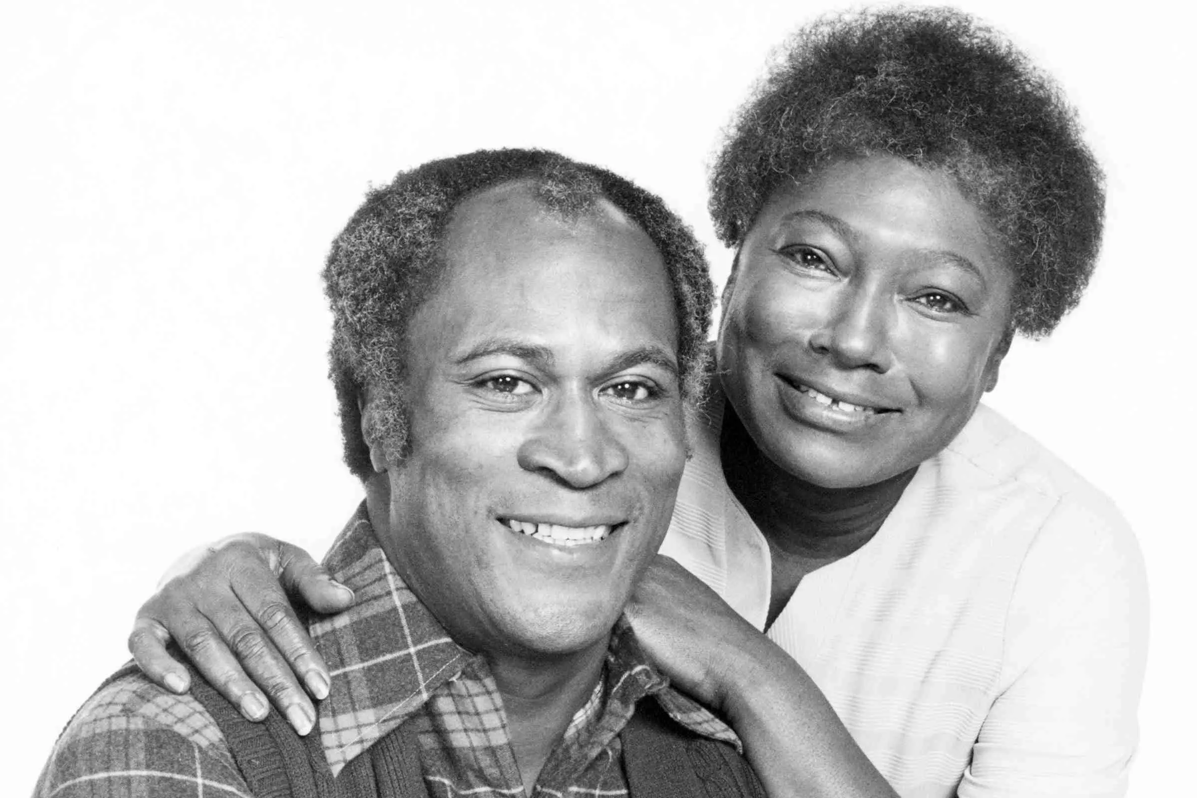 John Amos kama James Evans, Sr., na Esther Rolle kama Florida Evans katika mfululizo wa TV wa 1974 Good Times.