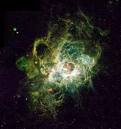 NGC 604, ട്രയാംഗുലം ഗാലക്സിയിലെ അയോണൈസ്ഡ് ഹൈഡ്രജന്റെ ഒരു മേഖല.